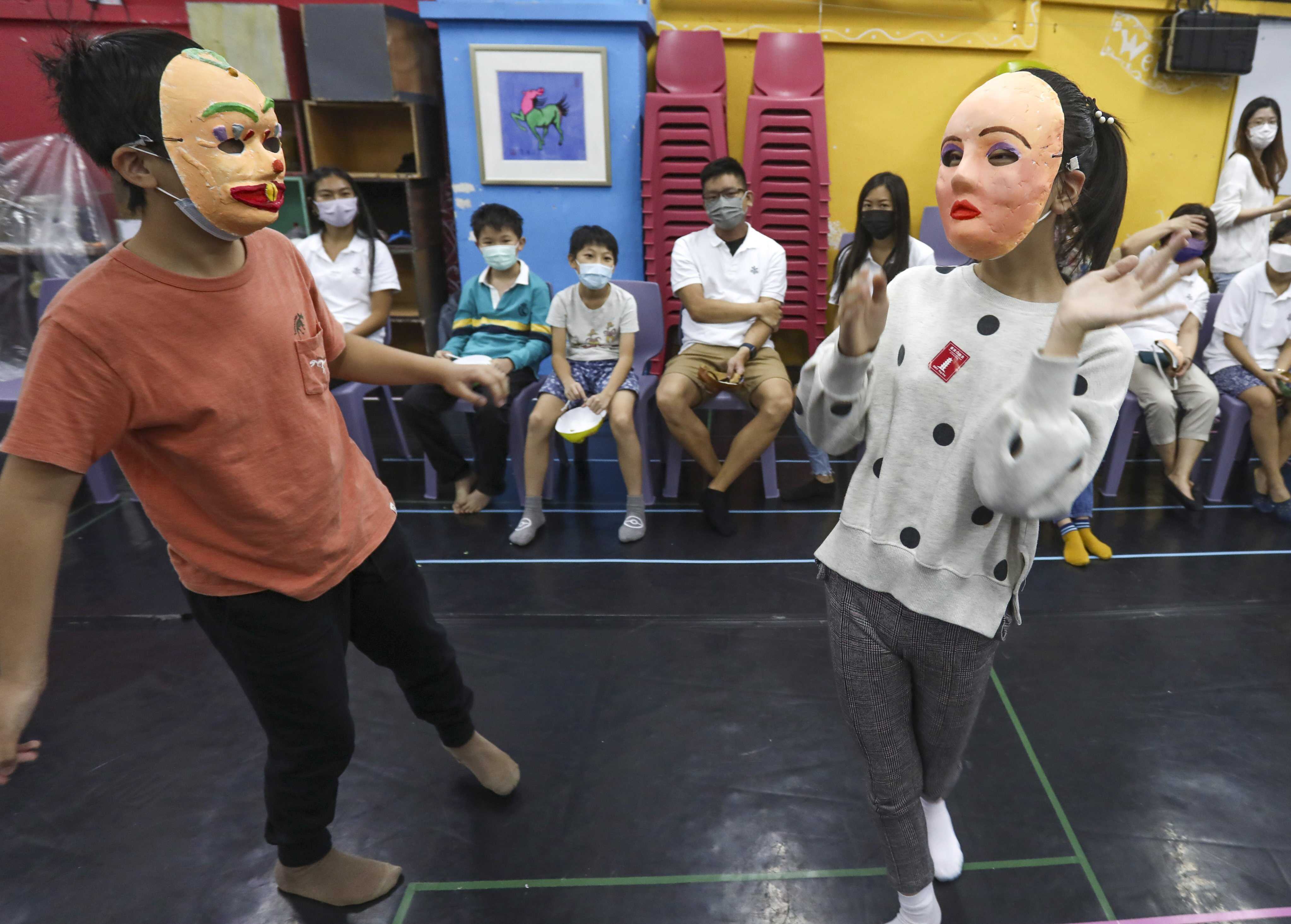 Hong Kong students use masks to express themselves at theatre workshop ...