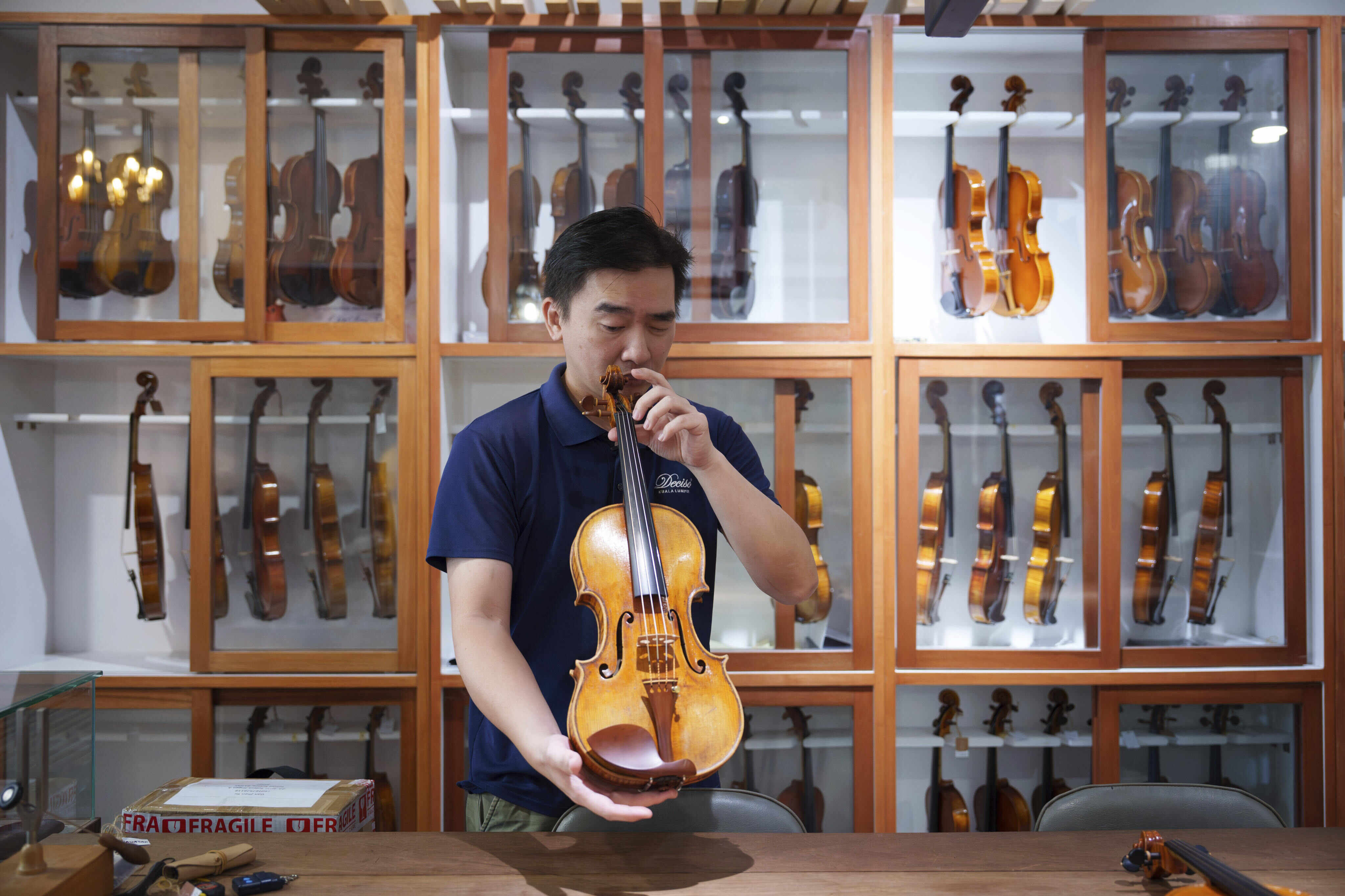 Malaysia’s pioneering violin maker crafts legacy from wood and passion ...