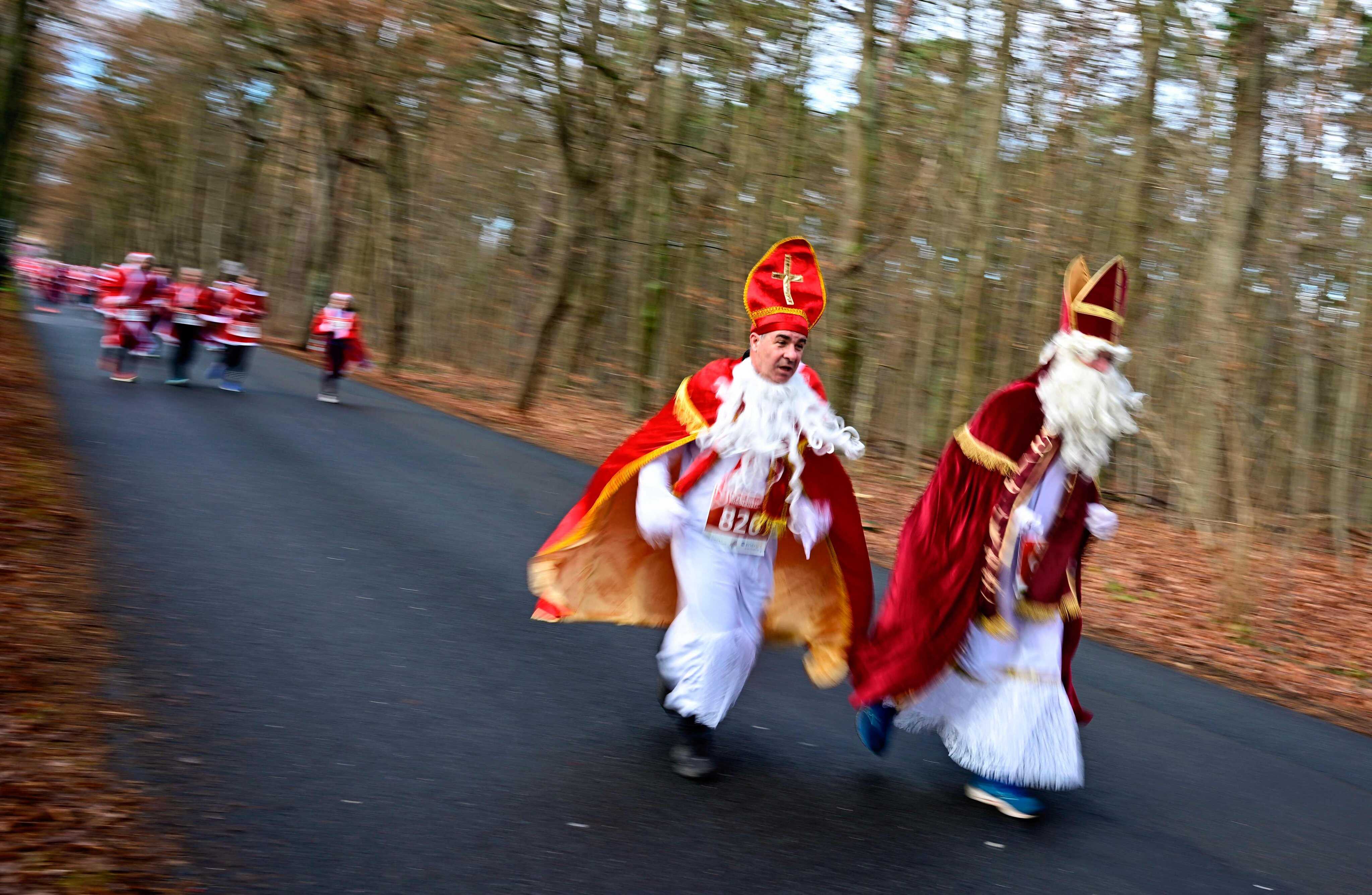 Write a funny caption for this Santa run in Germany | Young Post Club