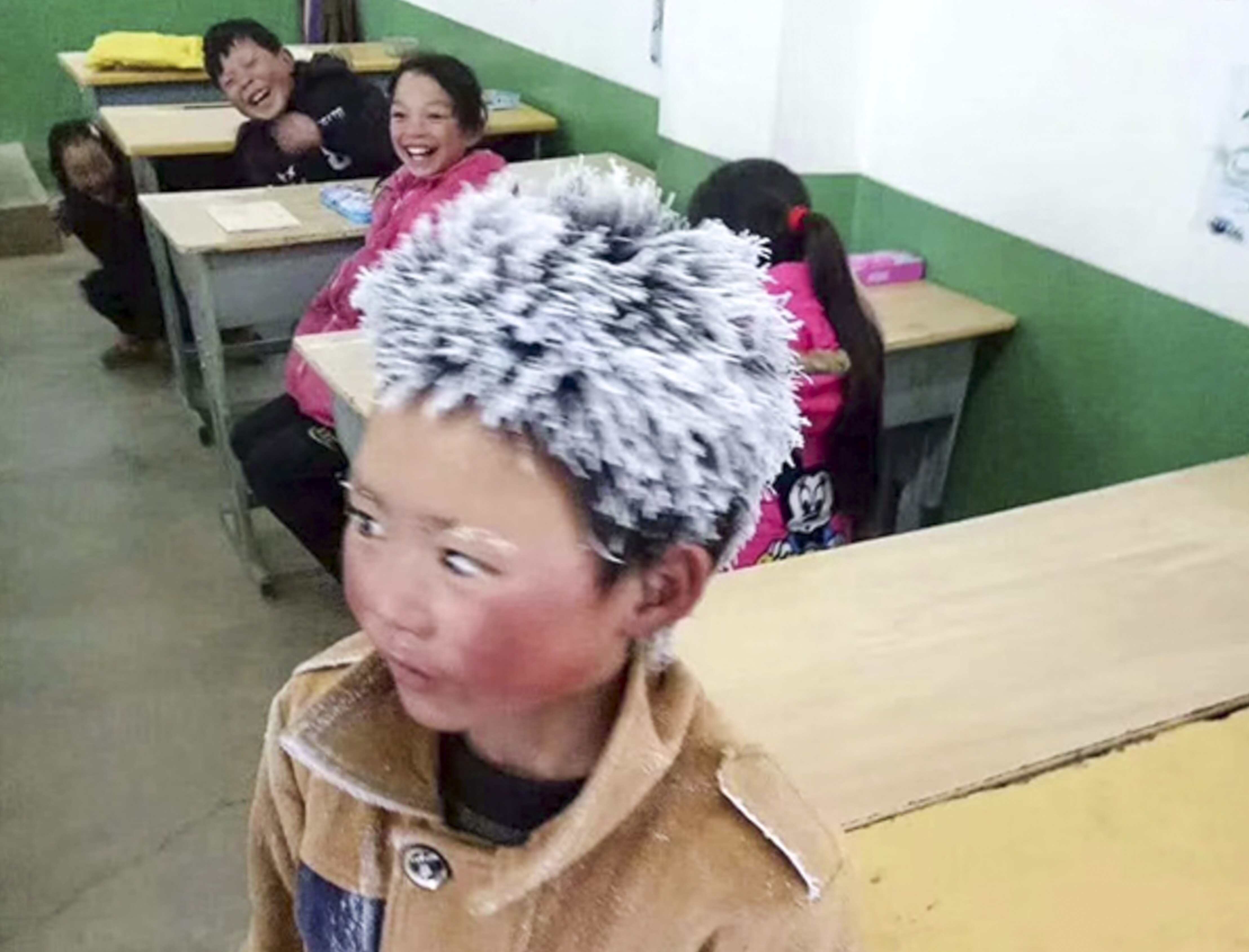 Poor Chinese boy’s frosty hair and eyebrows after sub-zero commute to ...