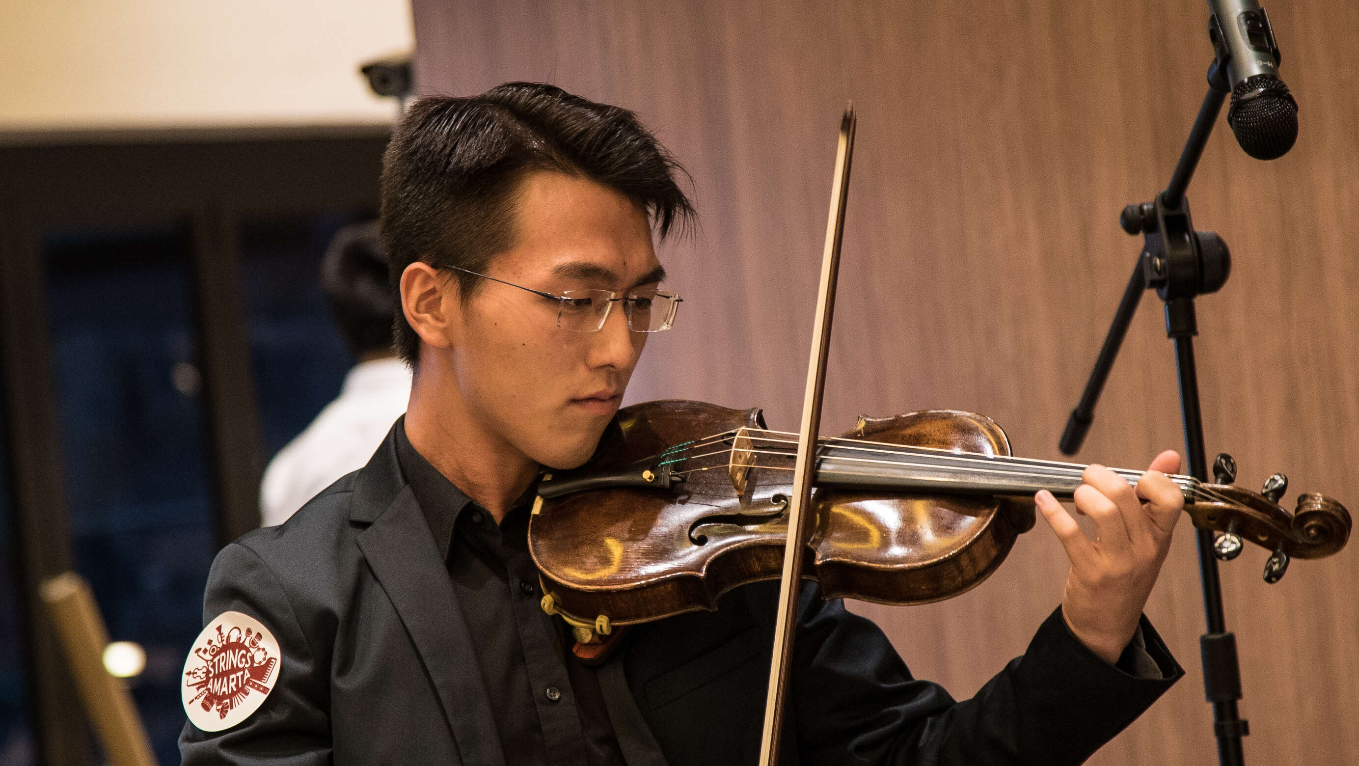 Chinese University business major Jonathan Law has the world on a string ... quartet | Young ...