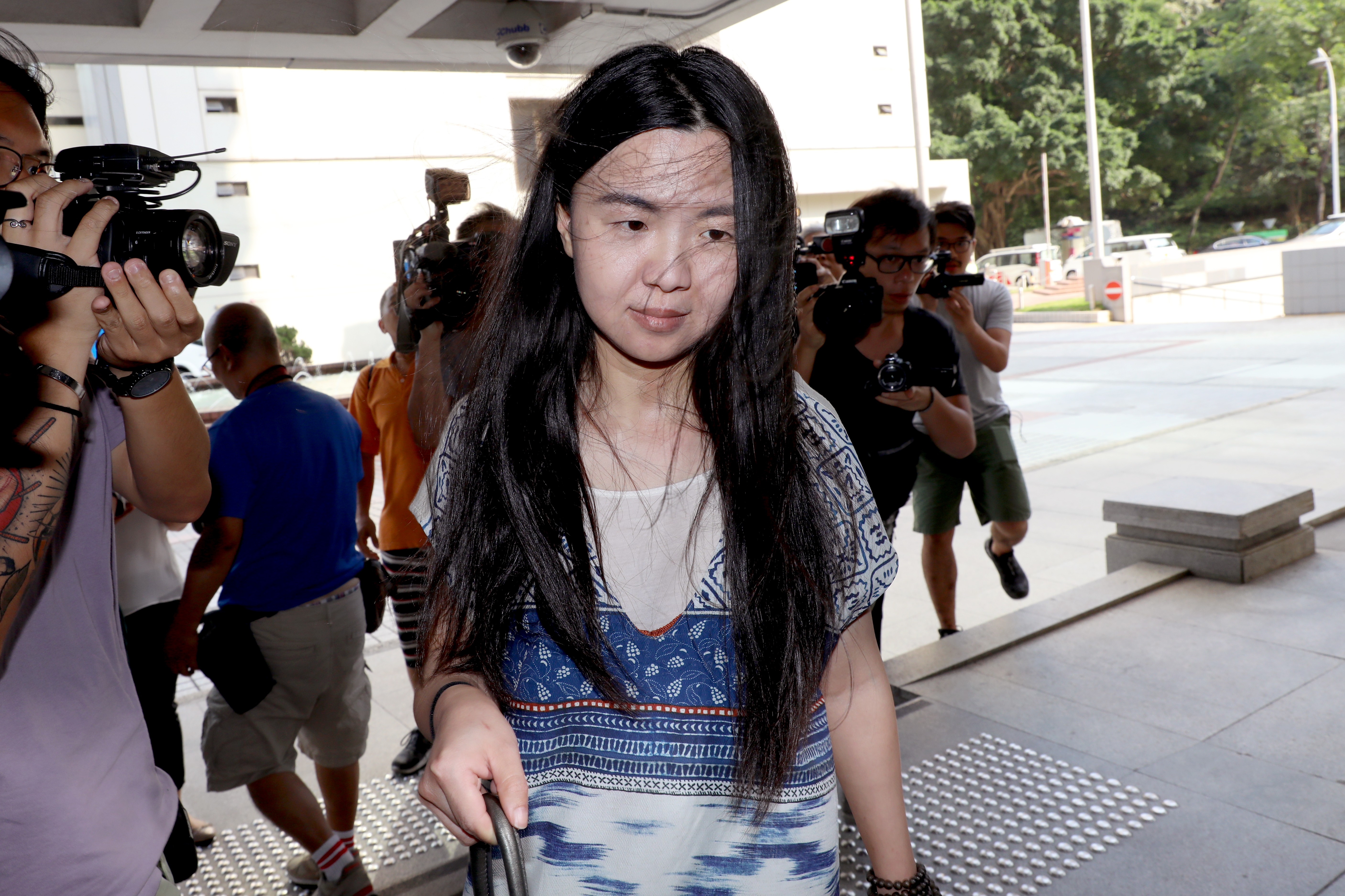 Mainland Chinese woman who snapped photos during Hong Kong trial found ...