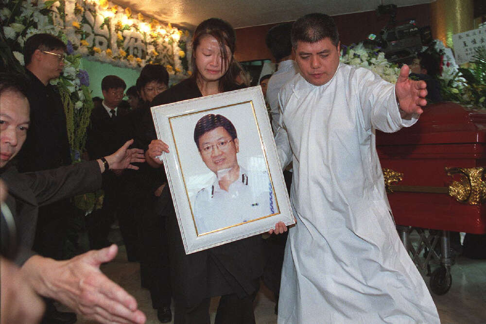The lives of undertakers in Hong Kong who handle more than 100 funerals ...