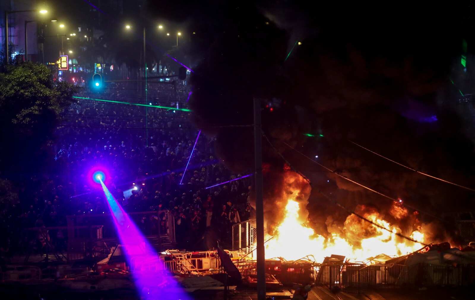 Hong Kong protests: police spray blue dye from water cannon and ...